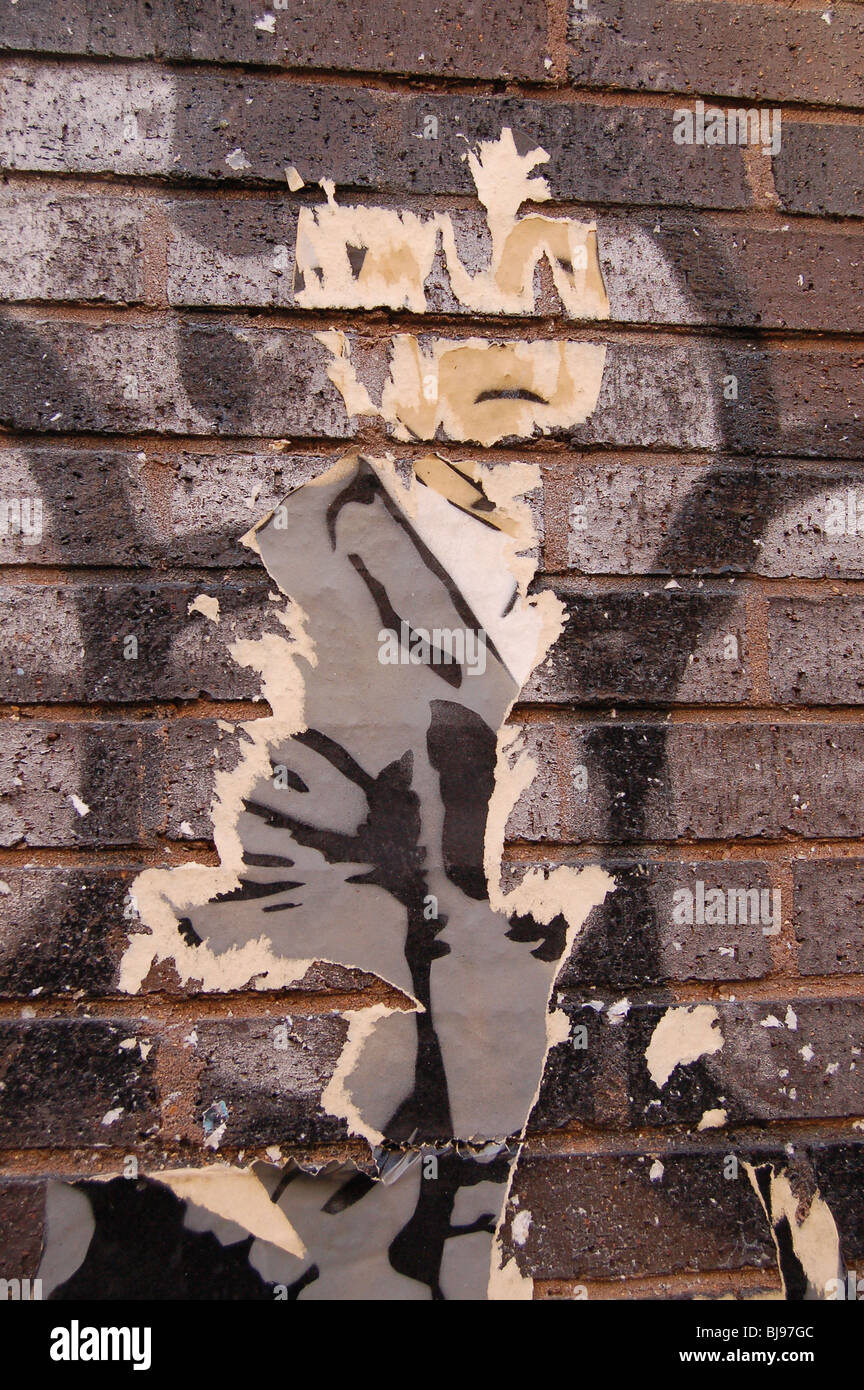 Street art, made of paper stuck to the wall Stock Photo - Alamy