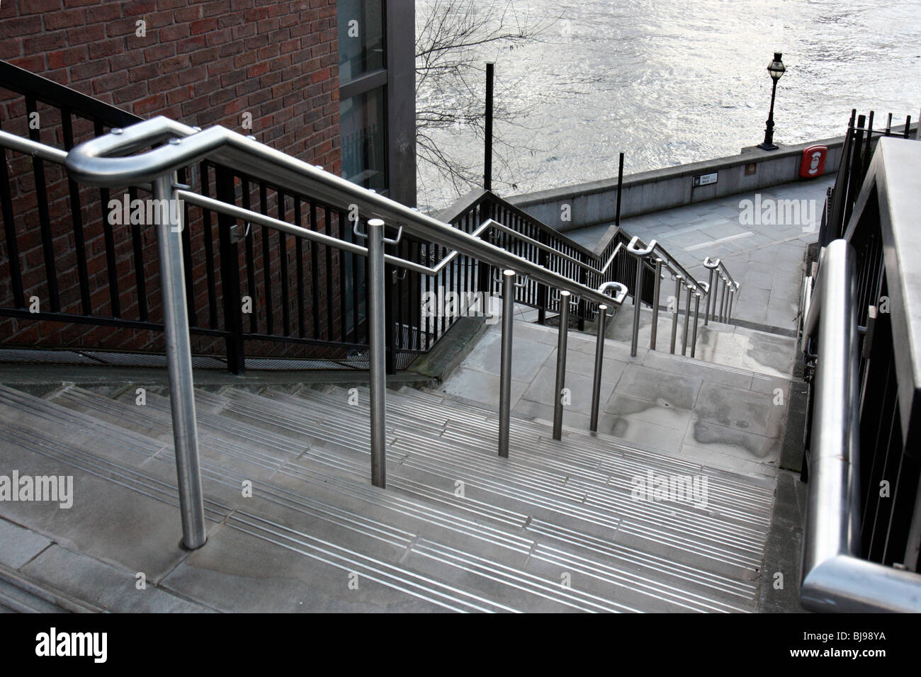a flight of stairs looking down on the river thames Stock Photo - Alamy