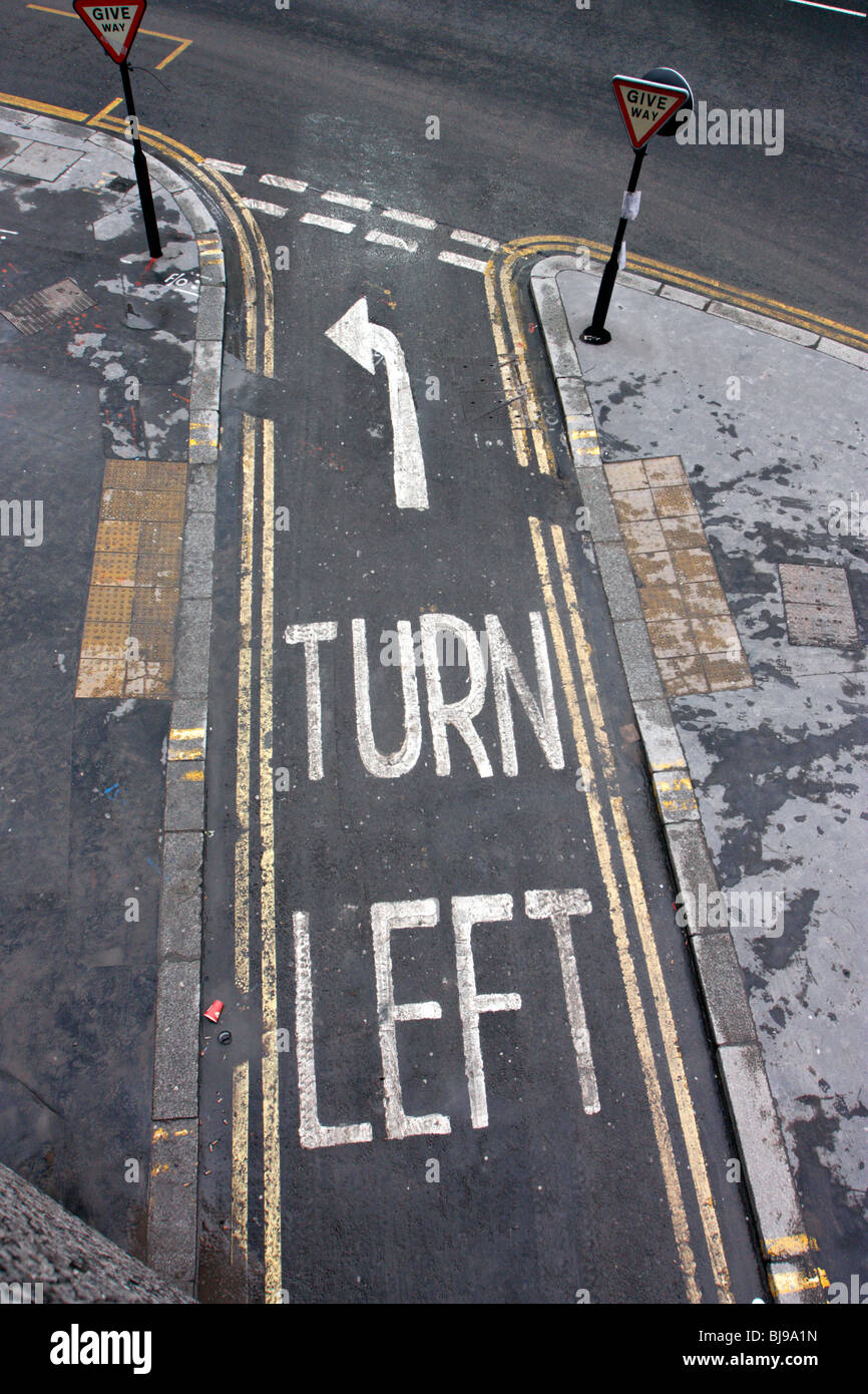 a sign saying turn left in london Stock Photo - Alamy