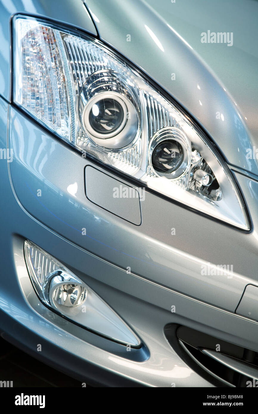 headlight of a modern luxury car at mercedes benz cars dealership in ...