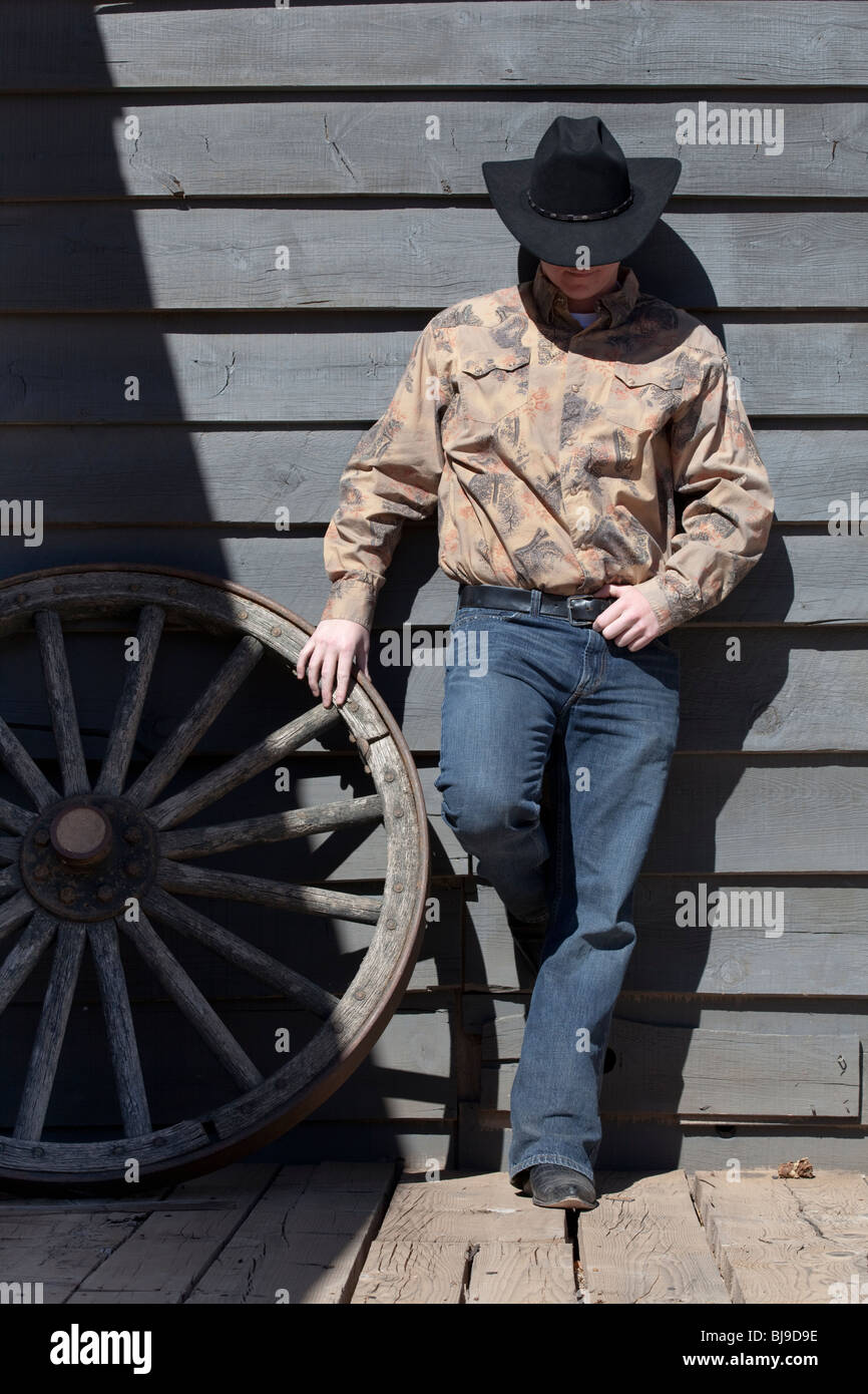 Portait cowboy leaning against wall hi-res stock photography and images ...