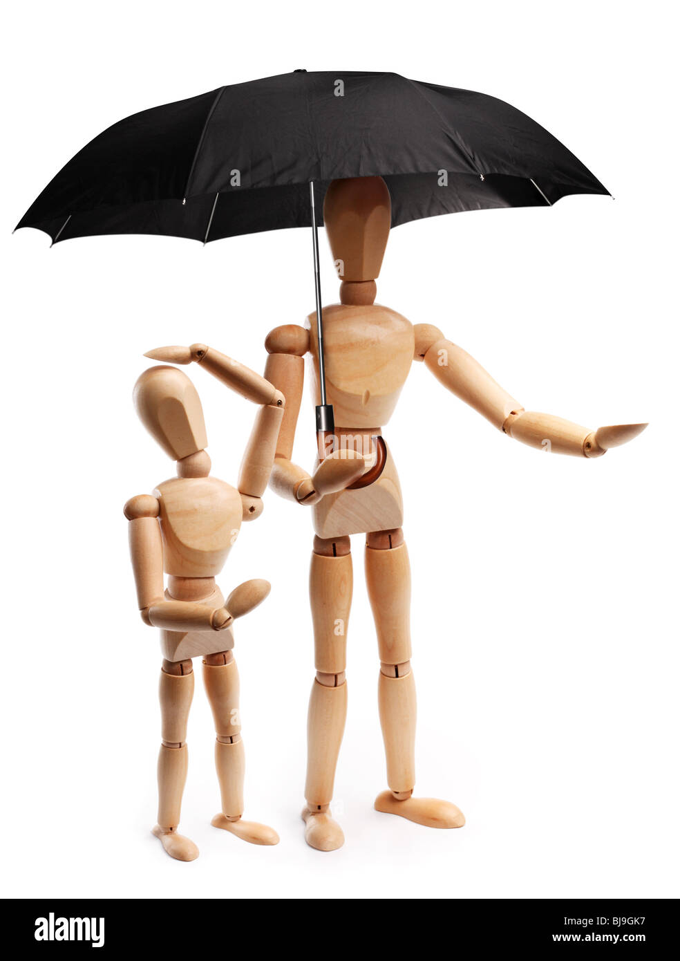 Wooden people under an umbrella. Objects on a white background Stock ...
