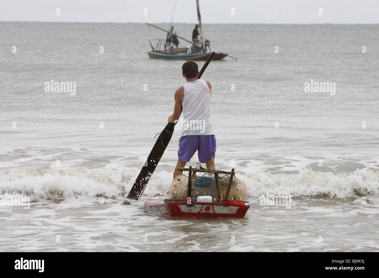 Boy in Fishing Boat Stock Photo - Alamy