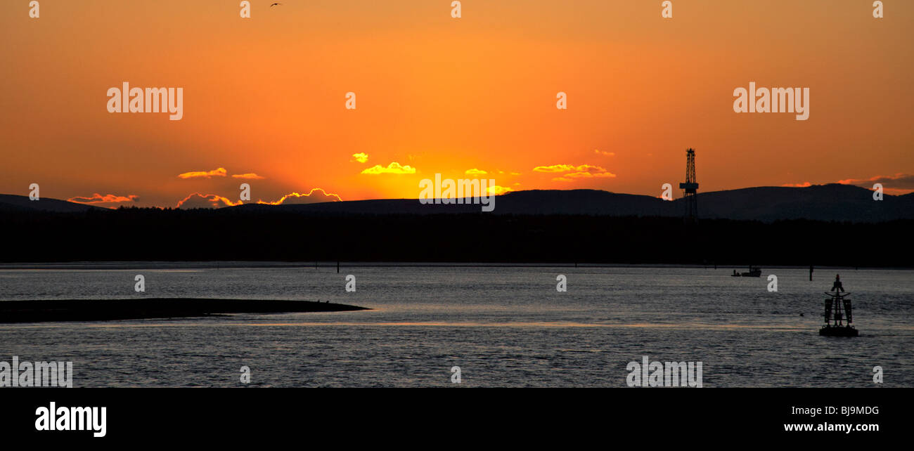 Sunset over poole harbour from sandbanks hi-res stock photography and ...