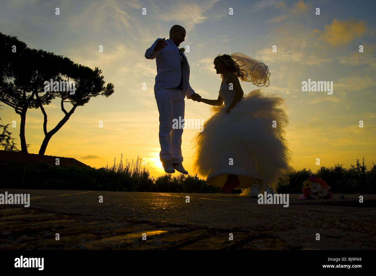 Bride groom jumping hi-res stock photography and images - Alamy