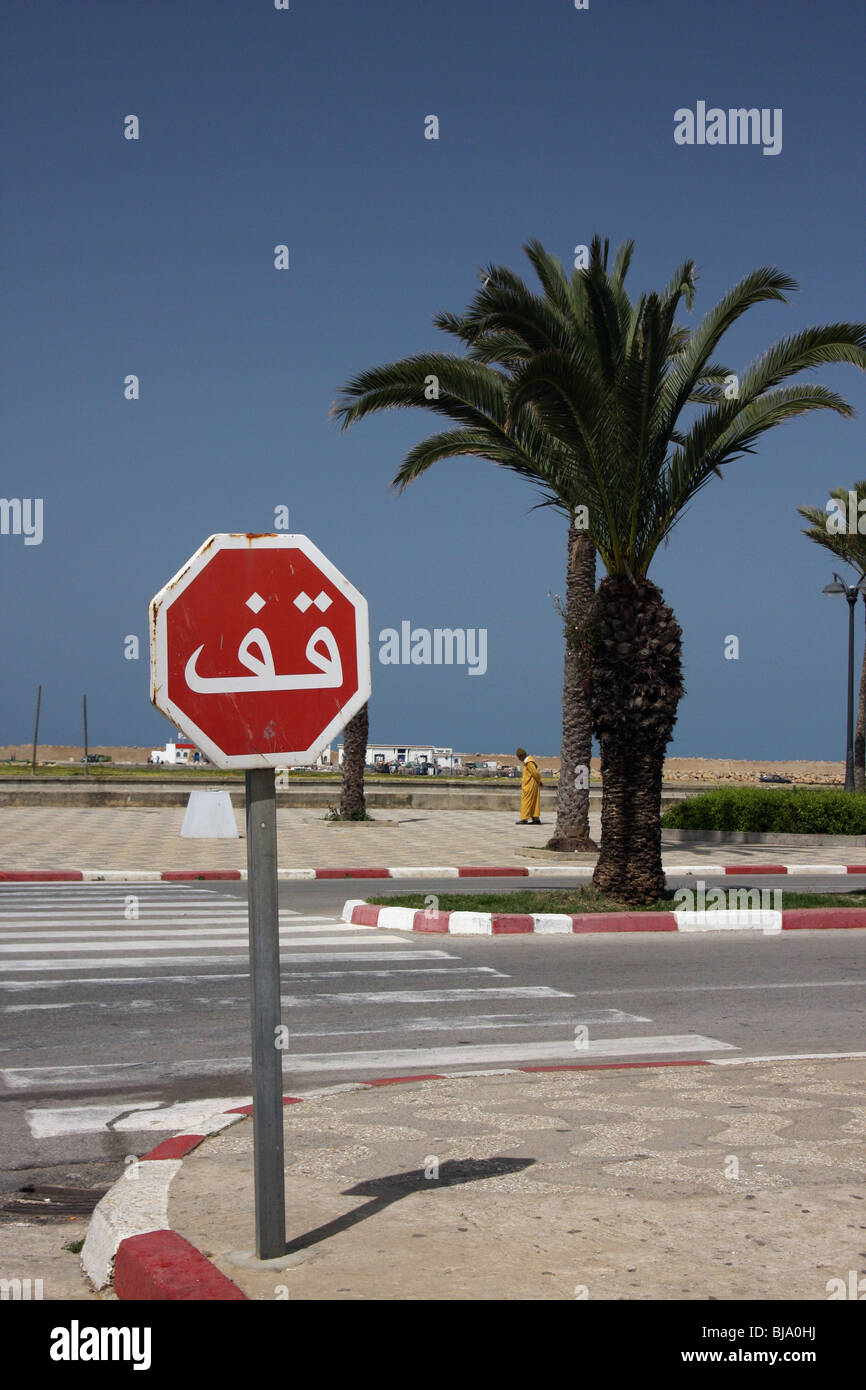 Stop sign in arabic hi-res stock photography and images - Alamy