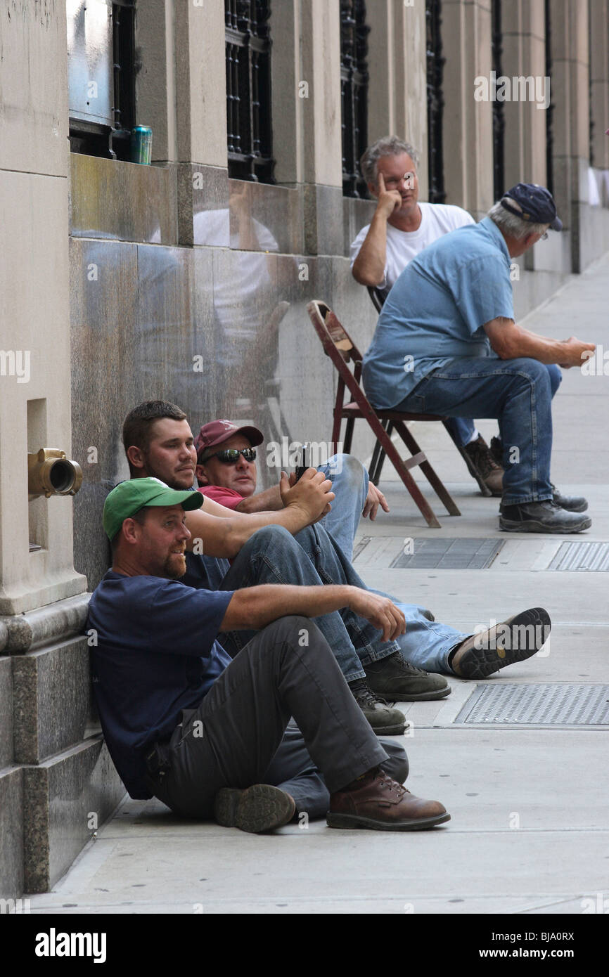 People wait on the pavement hi-res stock photography and images - Alamy