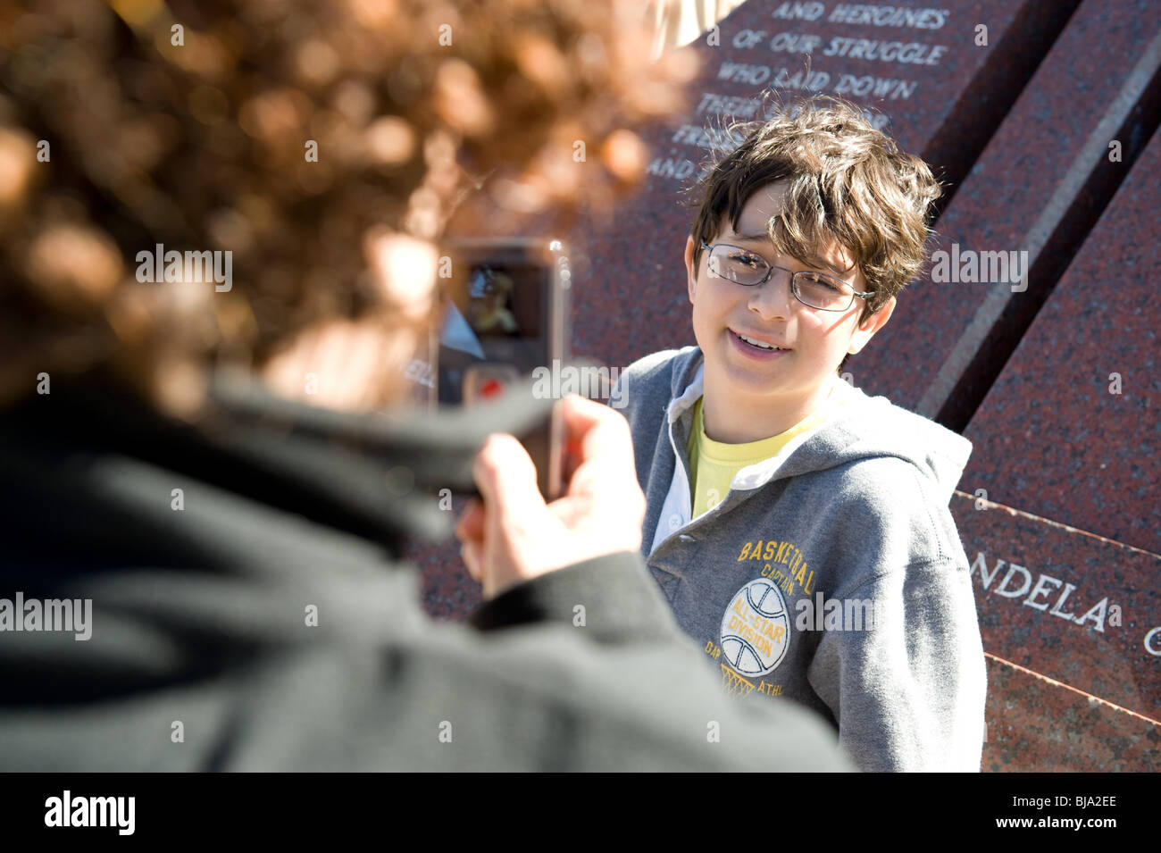 A boy being recorded on his HD video device Stock Photo - Alamy