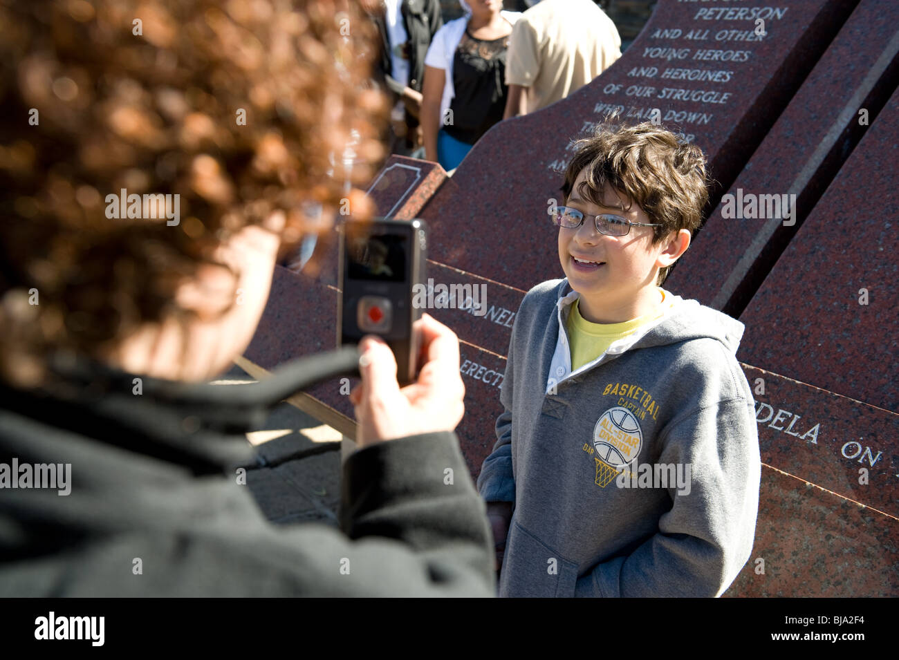 A boy being recorded on his HD video device Stock Photo - Alamy