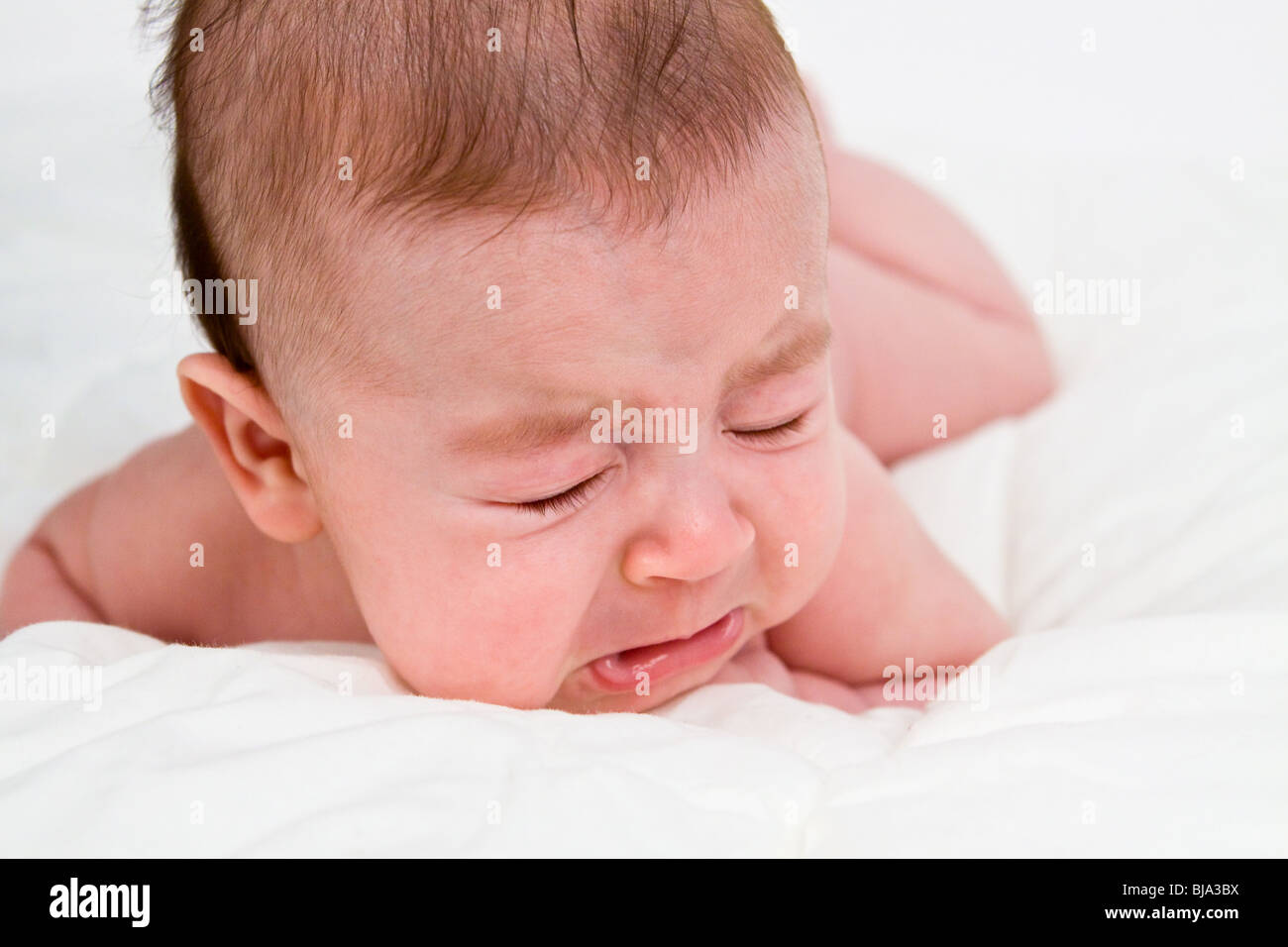 Crying baby face hi-res stock photography and images - Alamy