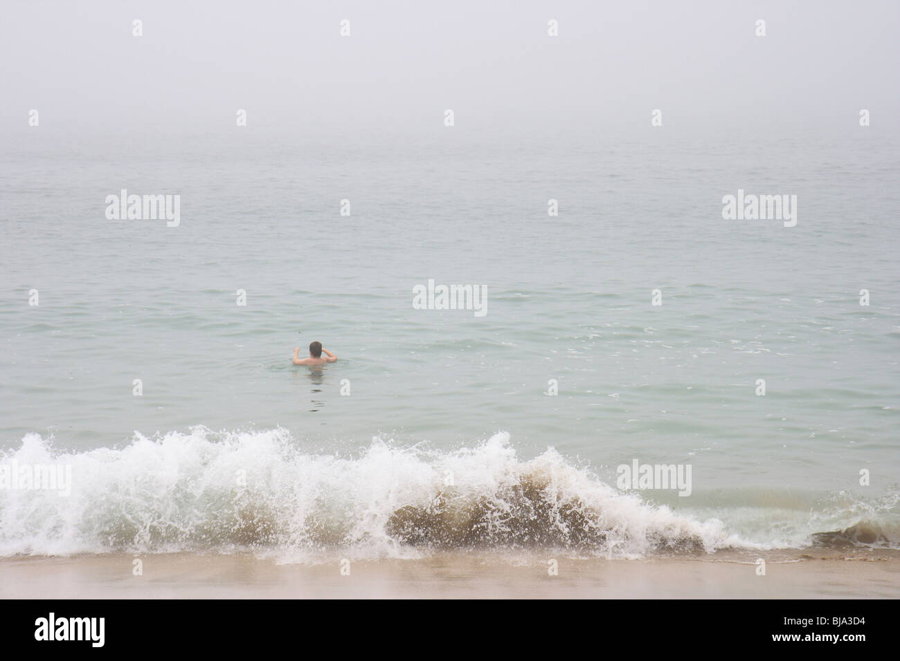 A tourist swimming in the ocean in the Arcadia National Park, Bar ...