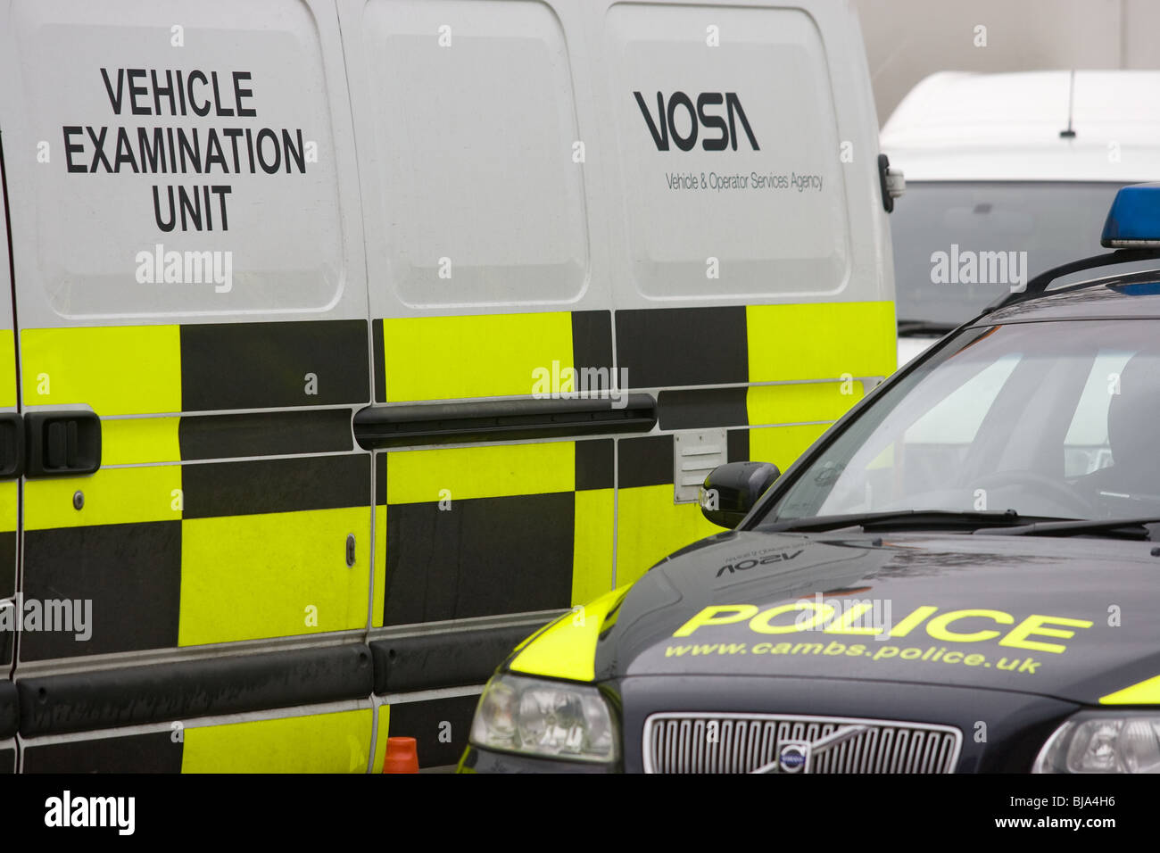 Police cars and VOSA Vehicle Examination Unit Stock Photo - Alamy