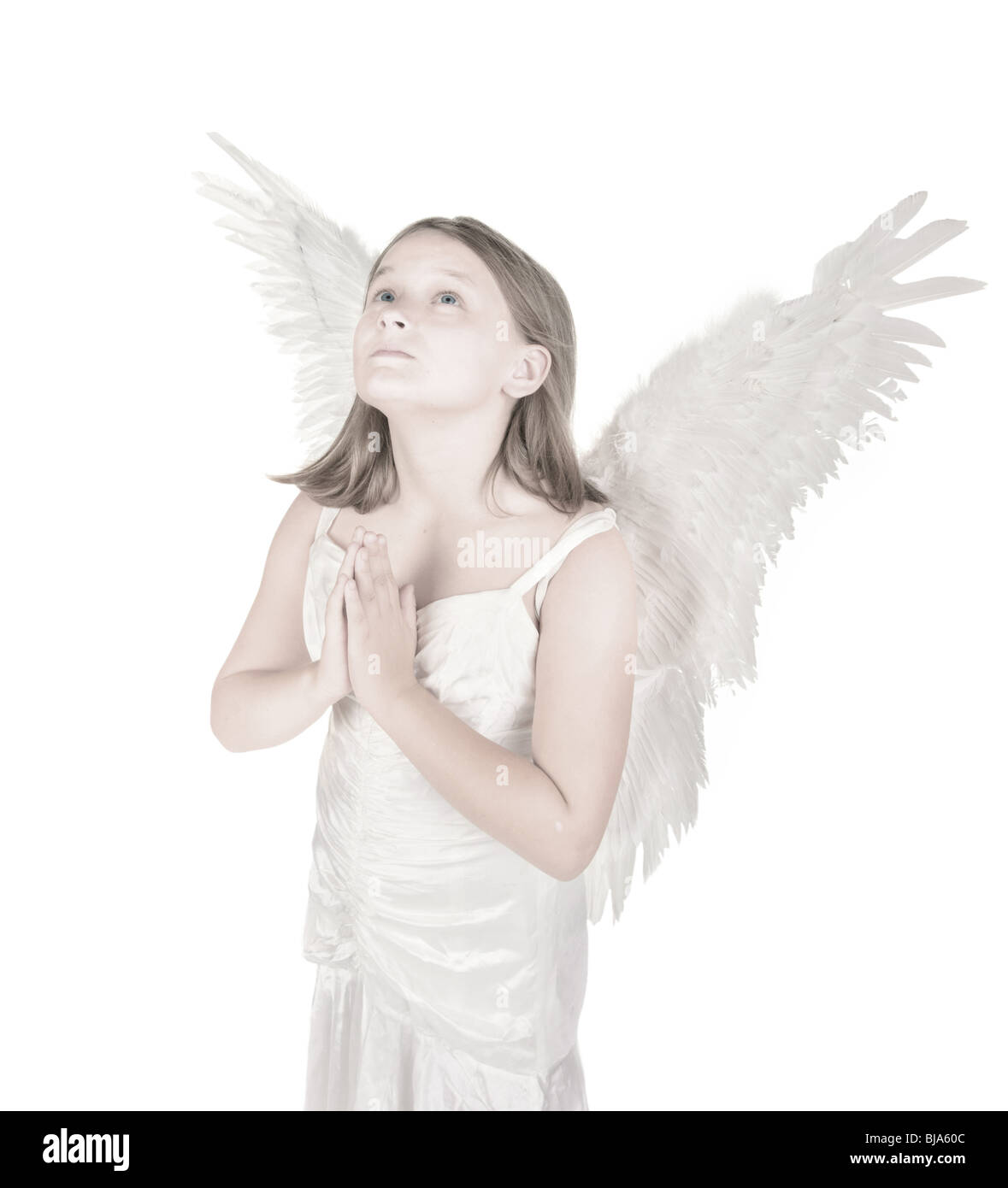 high key little angel fairy girl praying Stock Photo - Alamy