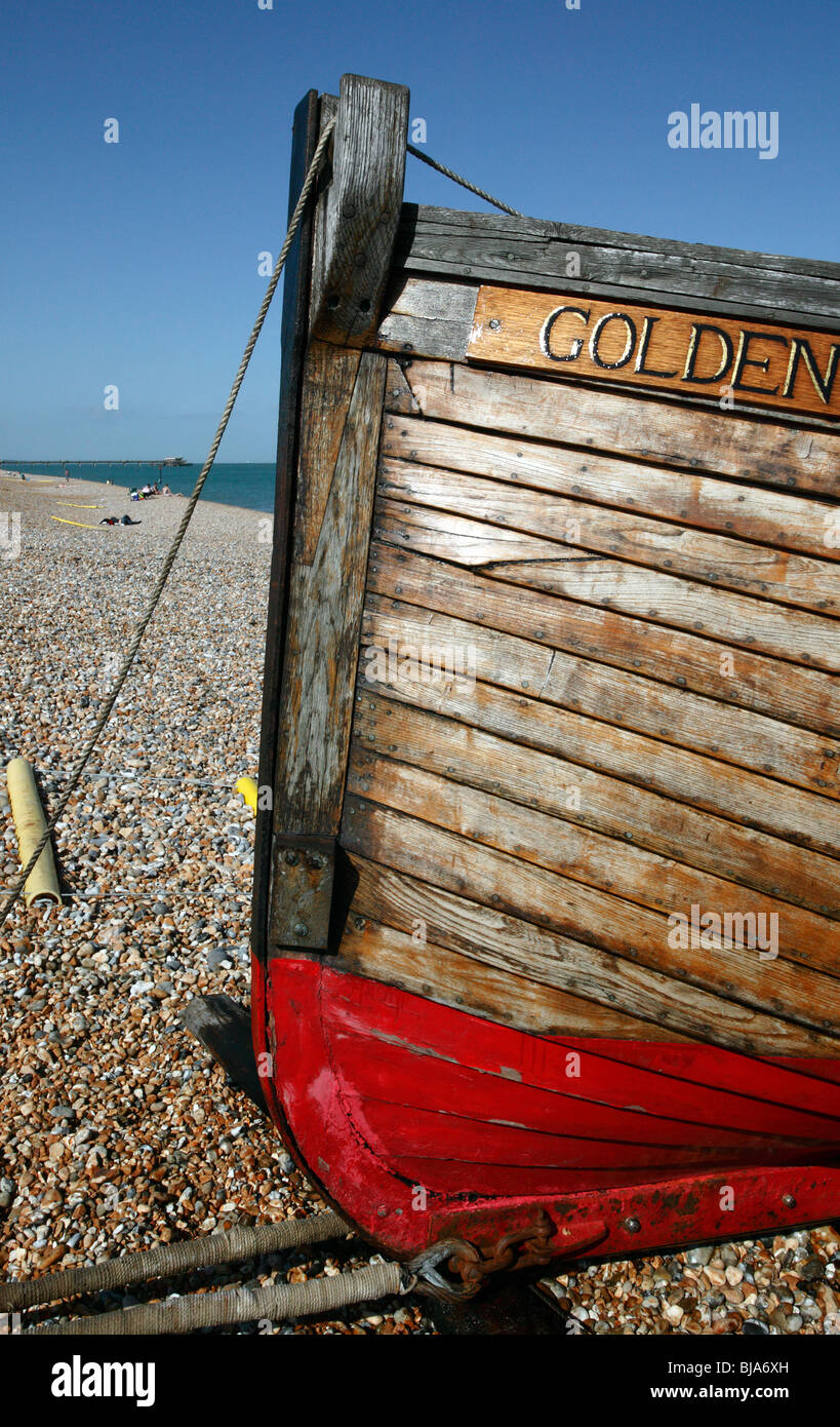 Golden Spray, a clinker-built, wooden fishing boat drawn up onto the ...