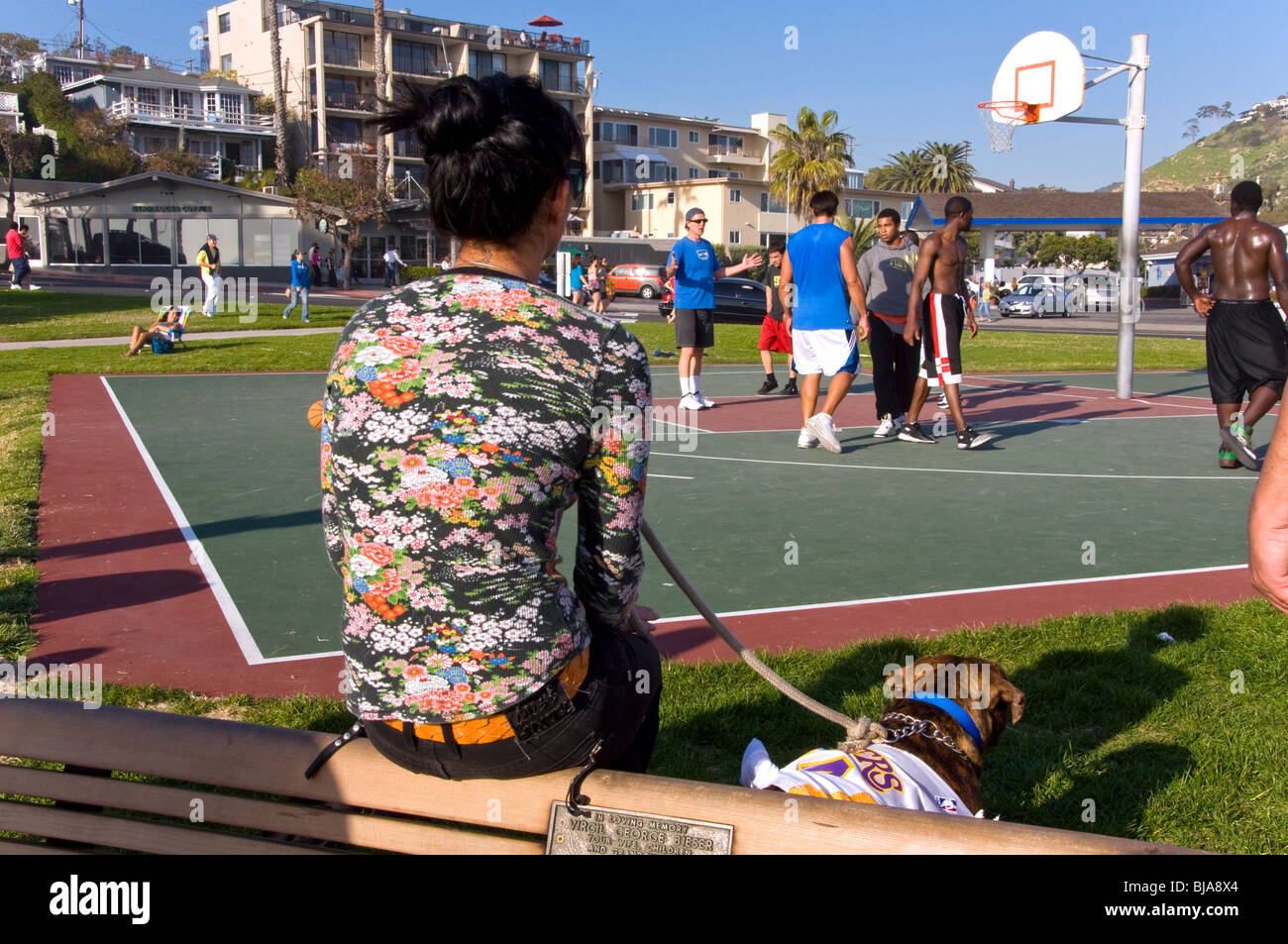 Men playing basketball on the California beach Stock Photo - Alamy