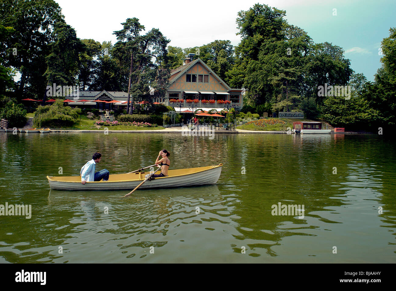 Paris, France - Urban Park, Landscape, COUPLE CANOING ON A LAKE., in ...