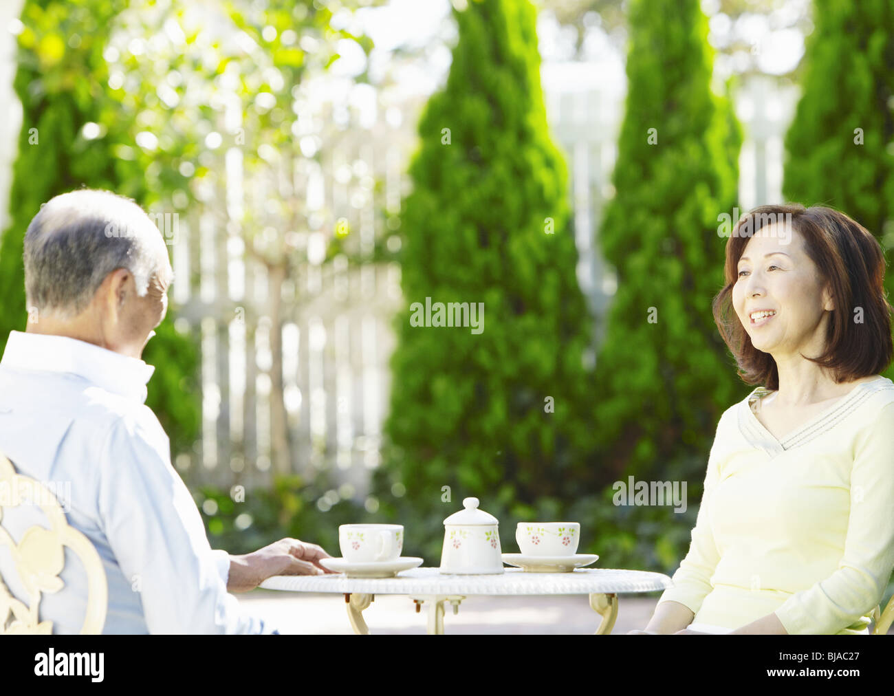 Couple having teatime Stock Photo - Alamy