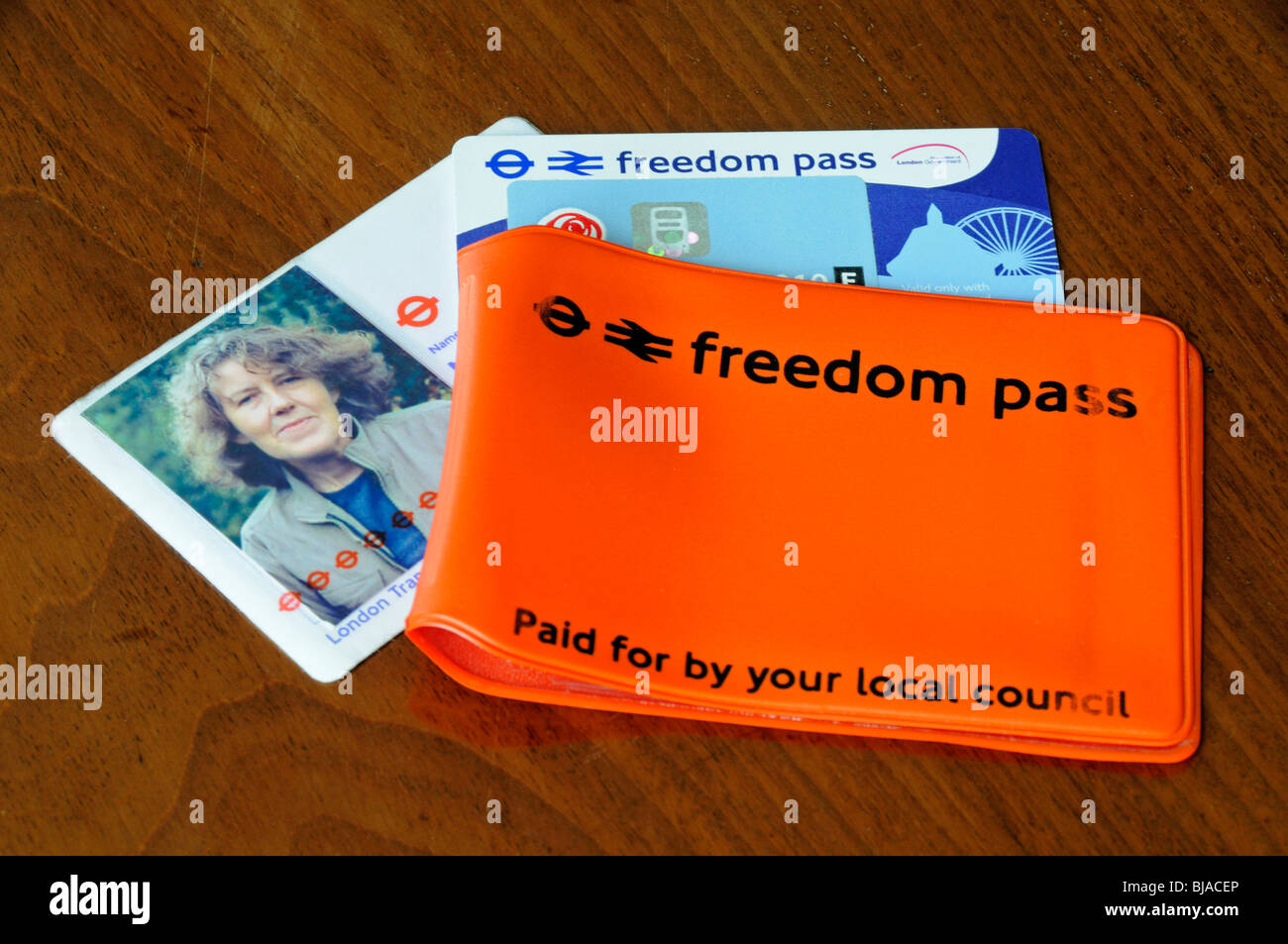 Freedom Pass on old table Stock Photo - Alamy