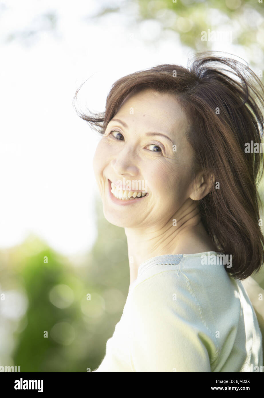 Senior woman smiling Stock Photo - Alamy