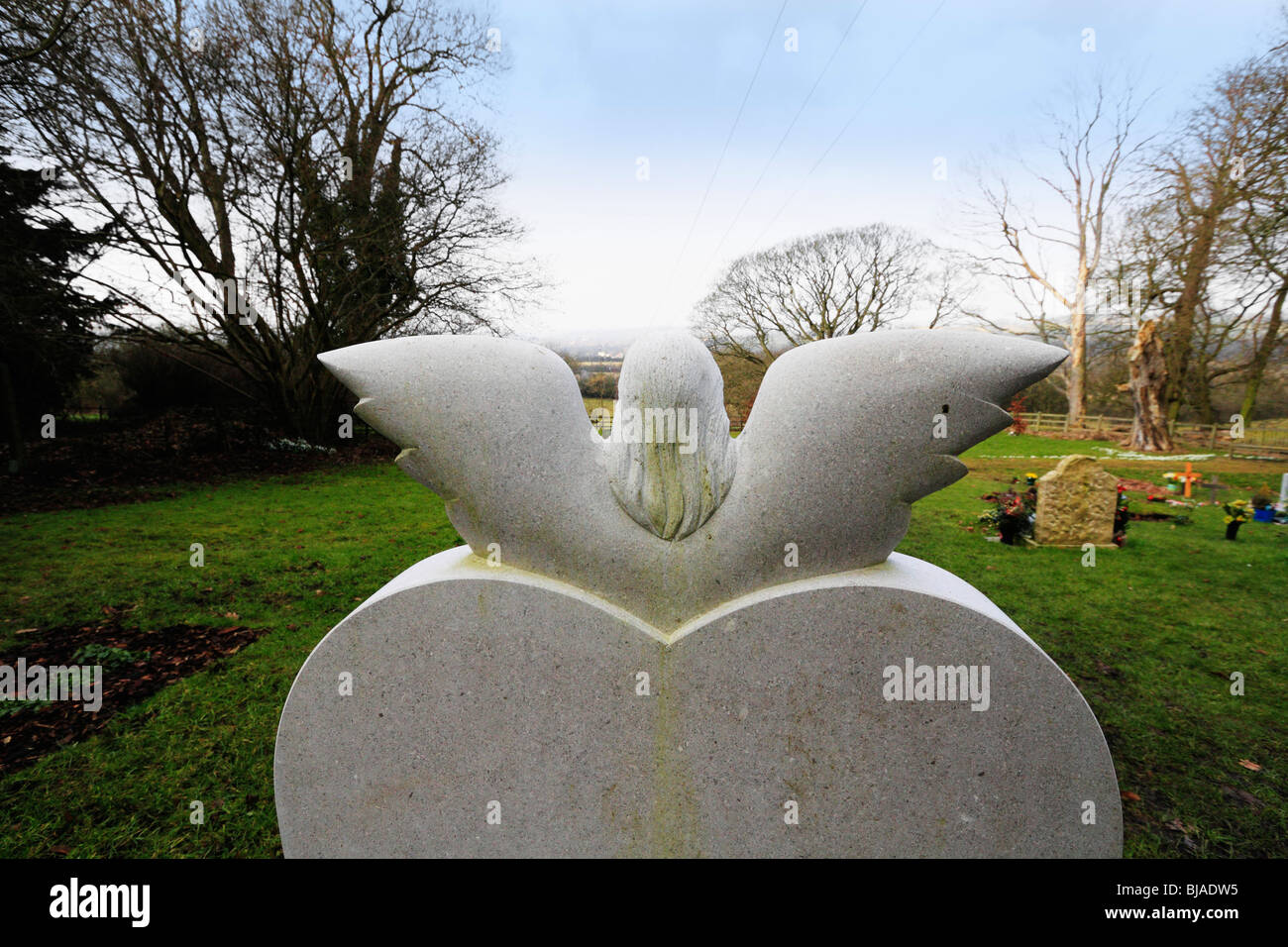 gravestones lit by the sun in a country cemetery Stock Photo - Alamy
