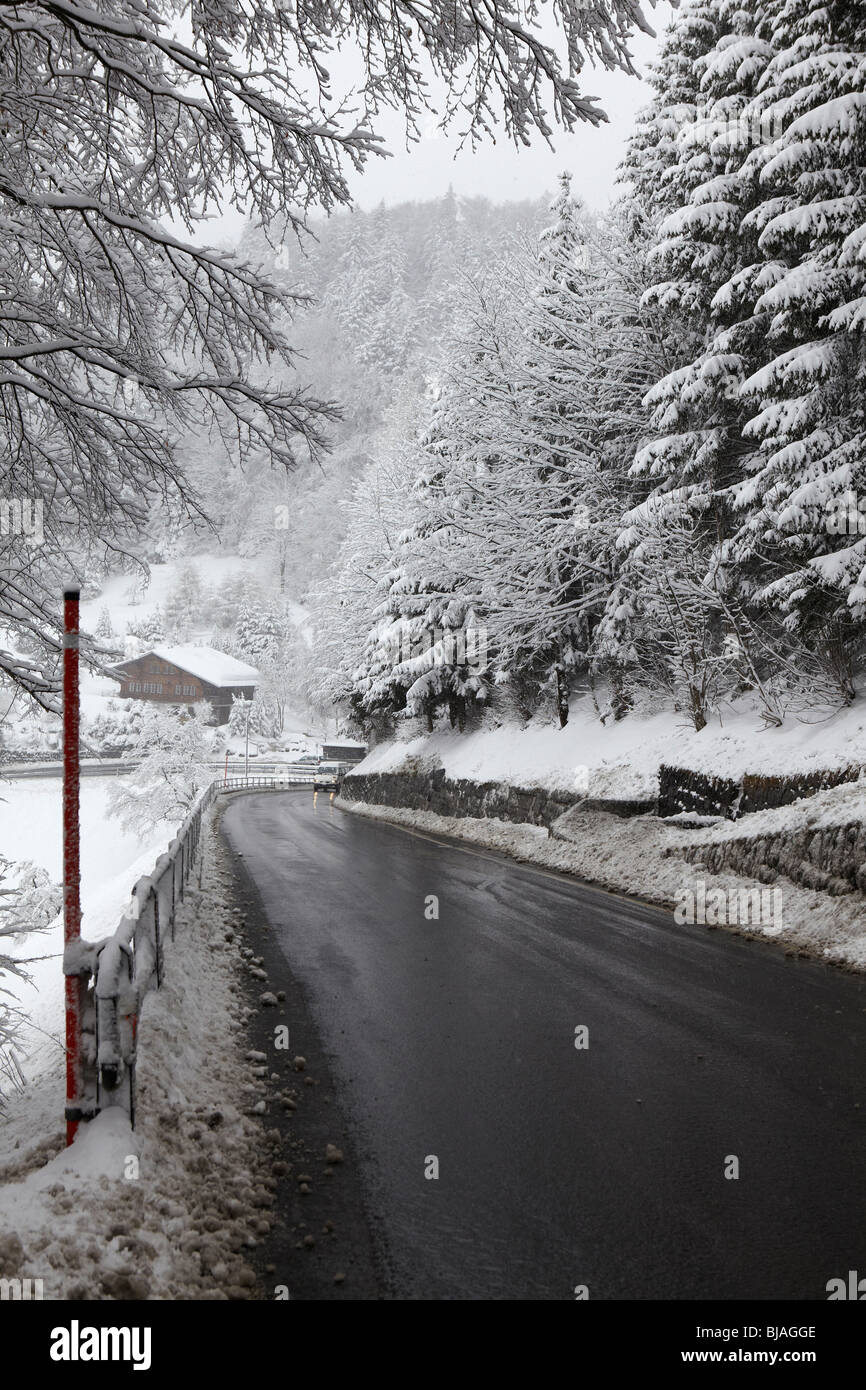 Cleared road in the snow, near Interlaken, Switzerland Stock Photo - Alamy
