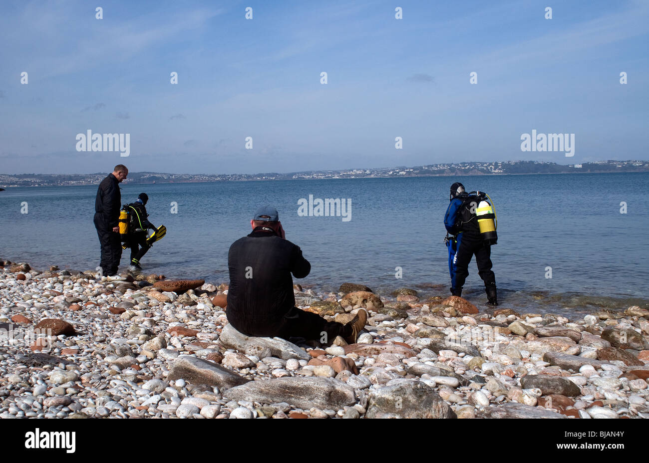 Diving off breakwater beach in brixham hi-res stock photography and ...