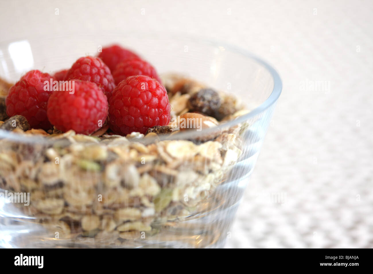 Raspberries and Muesli Stock Photo - Alamy
