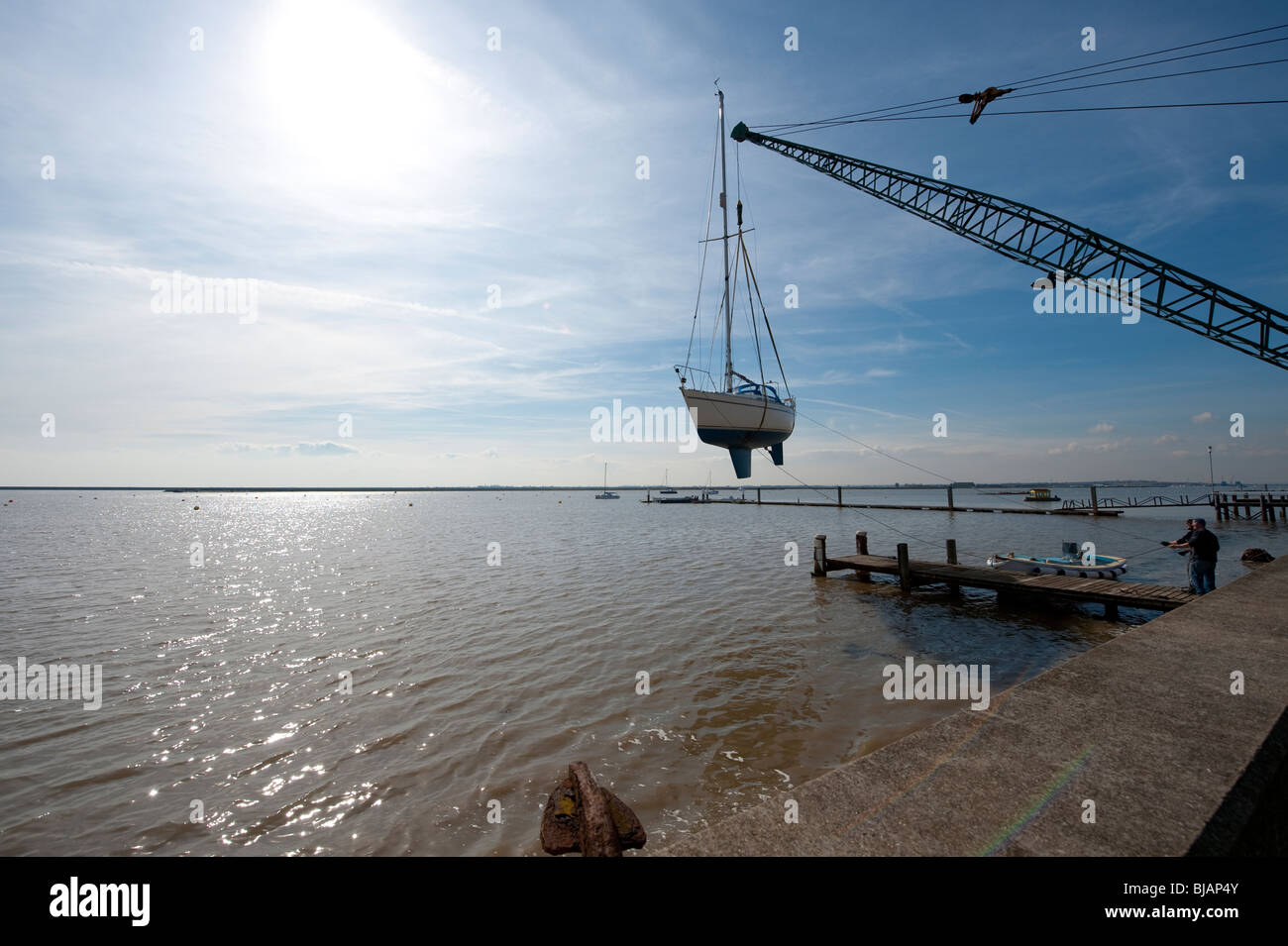 Cabin cruiser lifted by crane hi-res stock photography and images - Alamy