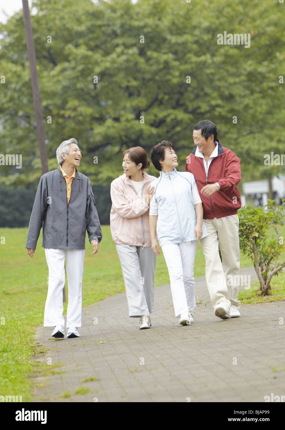 Senior group walking Stock Photo - Alamy