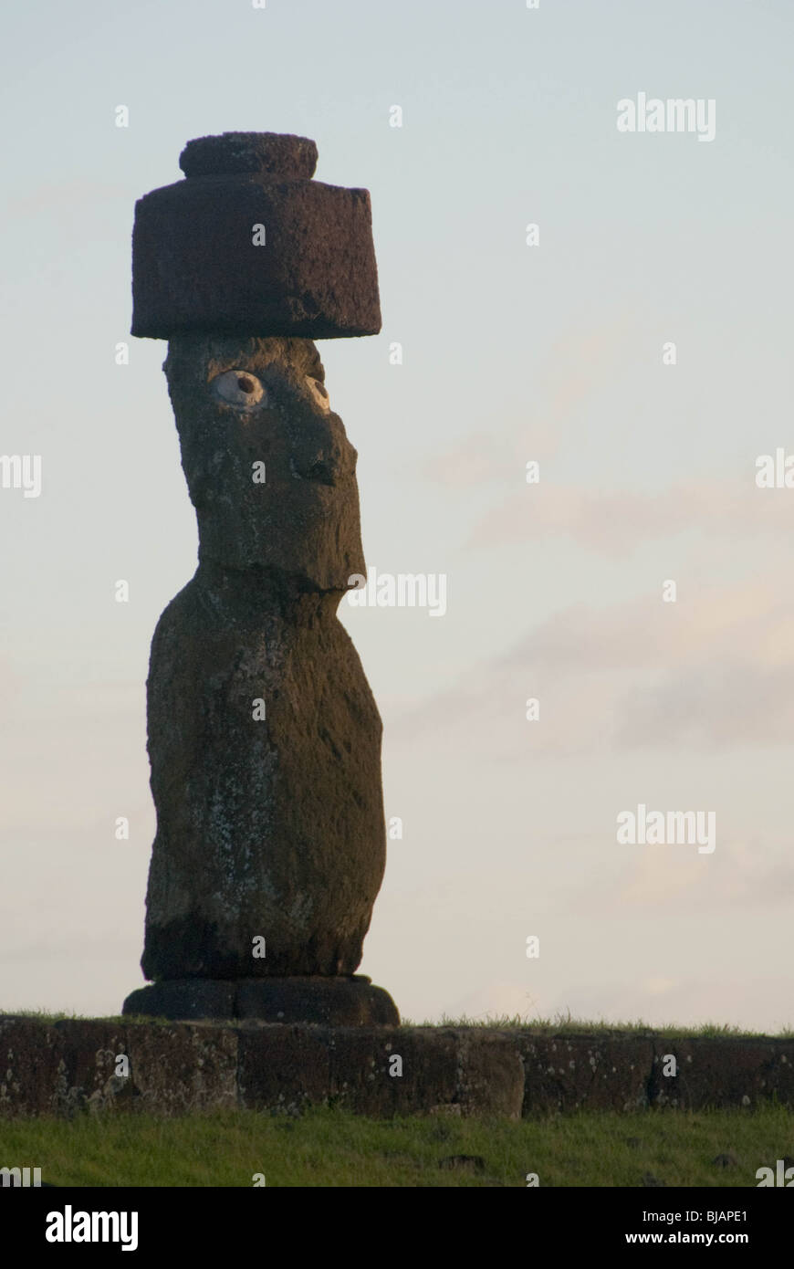 Moai with pukao and replica eyes on Ahu Ko Te Riku, in Hanga Roa. Rapa ...