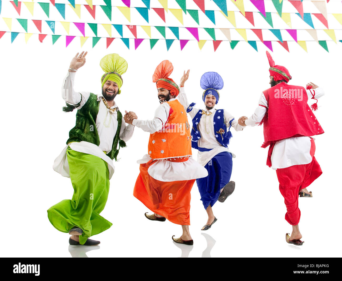 Sikh men dancing Stock Photo - Alamy