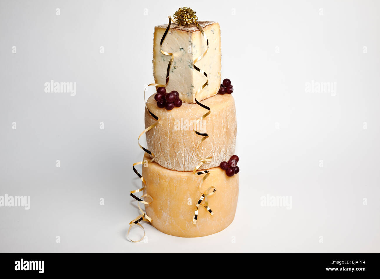 Celebration tower whole round cheeses hi-res stock photography and ...