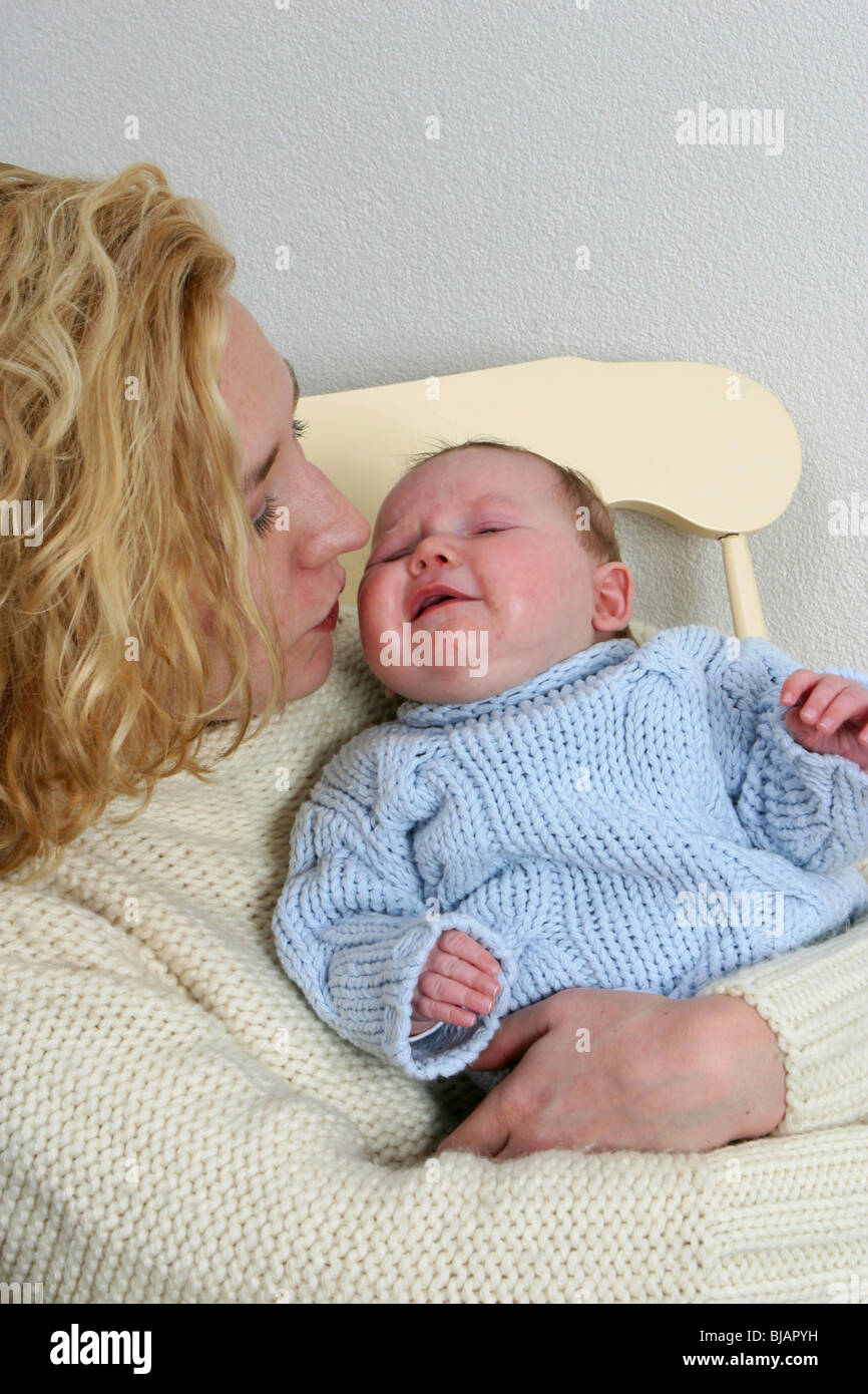 Calming crying baby hi-res stock photography and images - Alamy