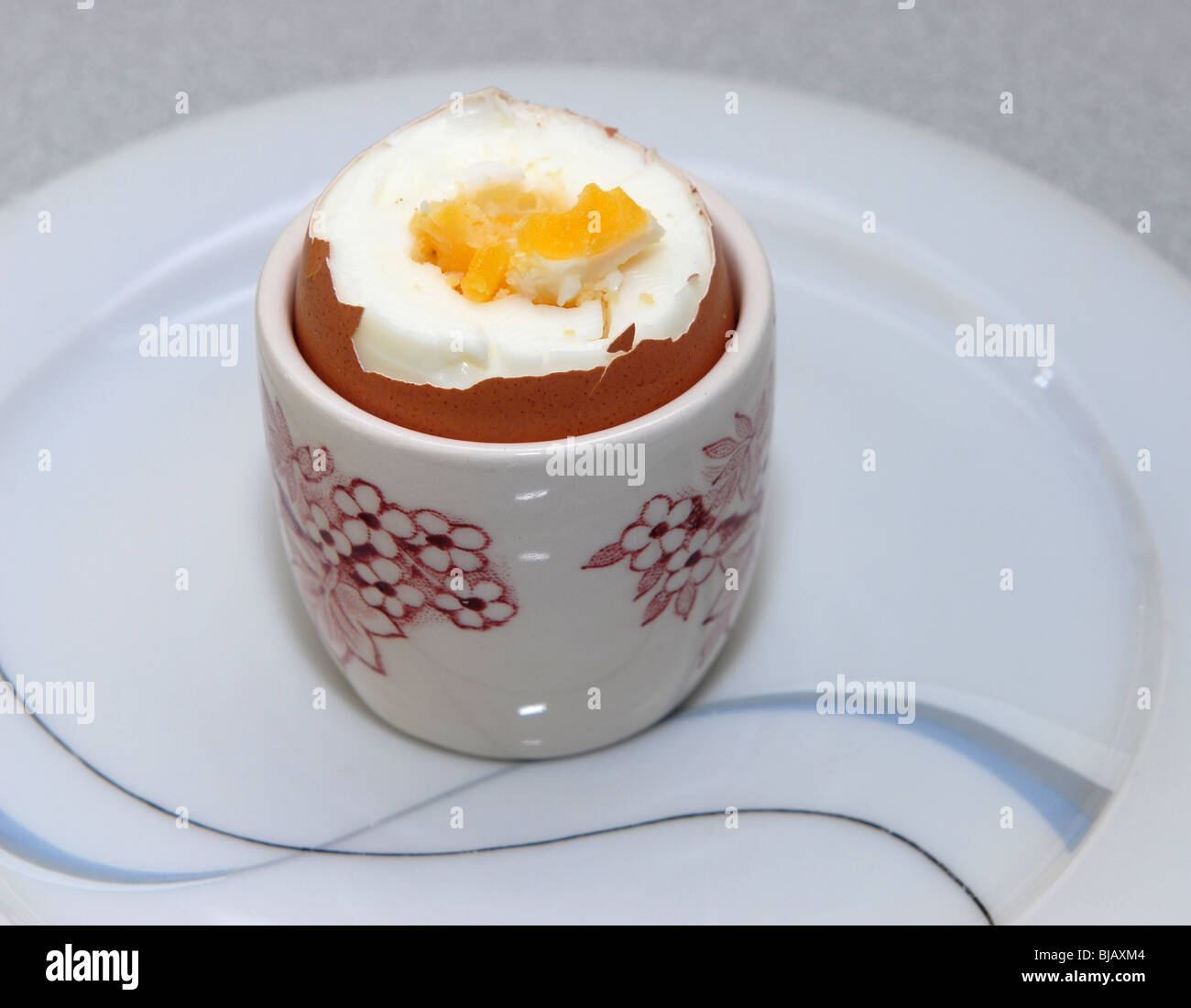 A fresh boiled egg open and ready to eat for a healthy breakfast ...