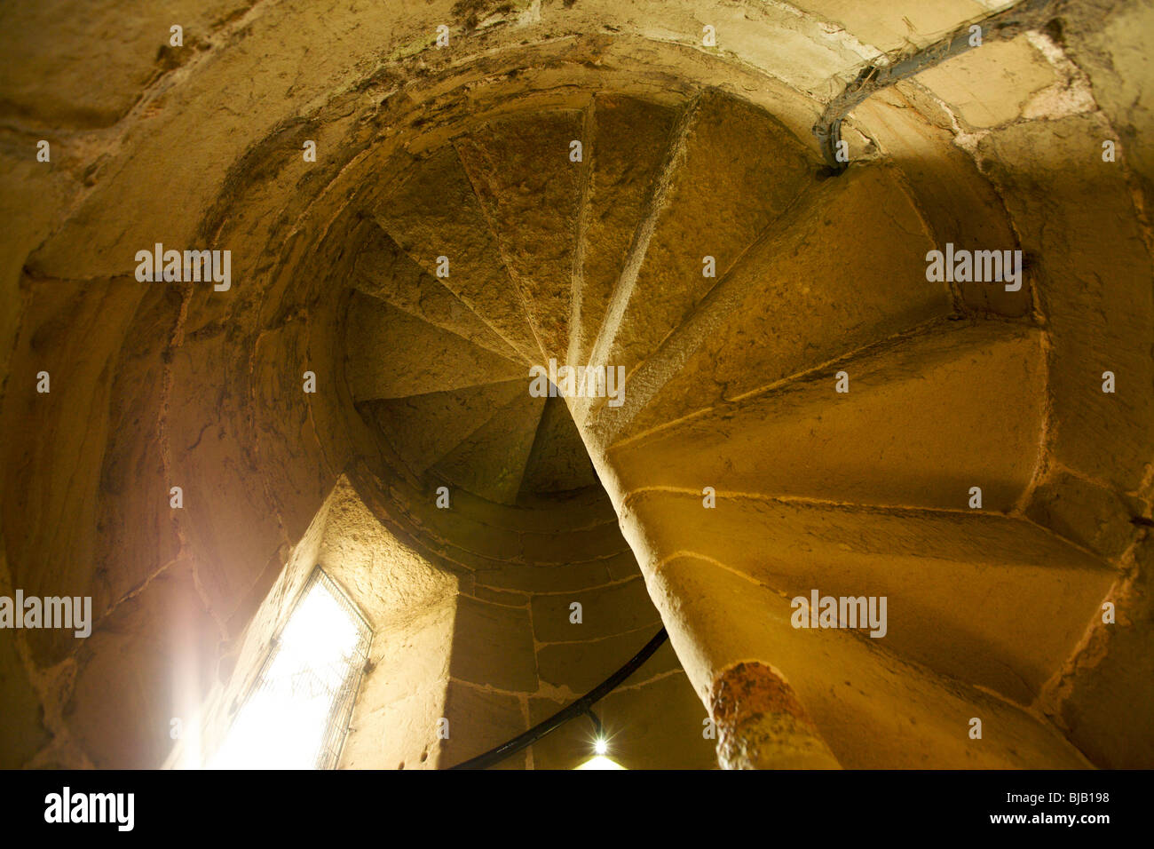 Spiral stone staircase in a castle tower Stock Photo - Alamy
