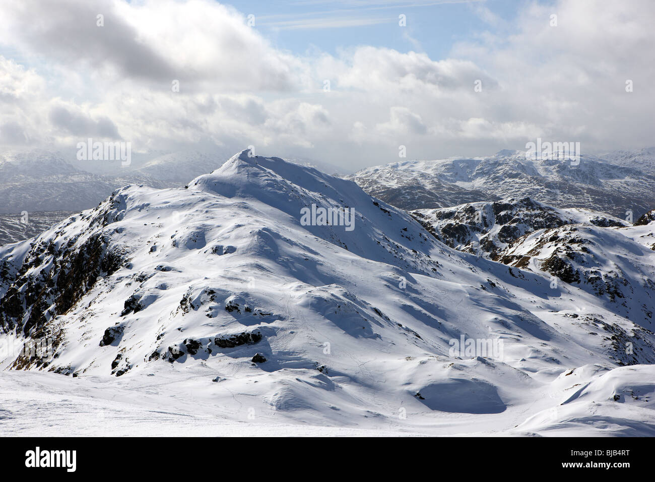 A snow covered Meall Garbh taken from the summit of Meall Nan Tarmachan ...