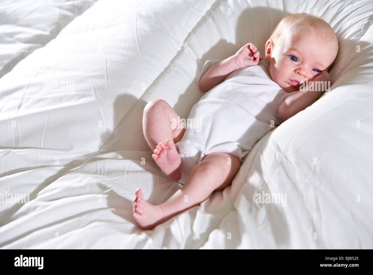 One month old baby lying hi-res stock photography and images - Alamy
