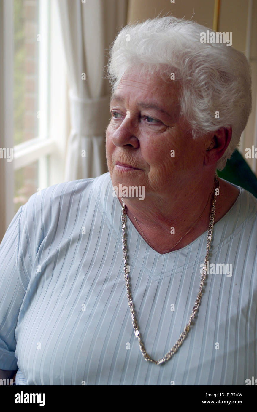 Sad elderly lady hi-res stock photography and images - Alamy