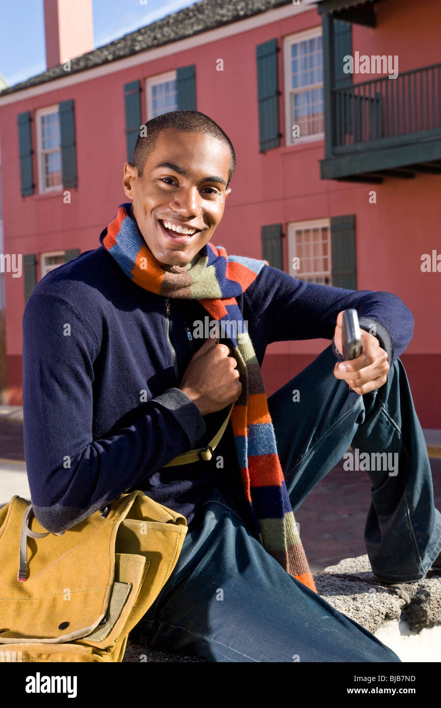 Handsome stylish young African-American man outside building Stock ...