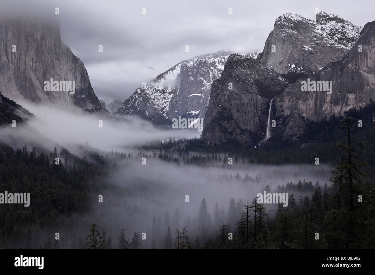 Clearing winter storm with clouds and fog in Yosemite Valley from ...