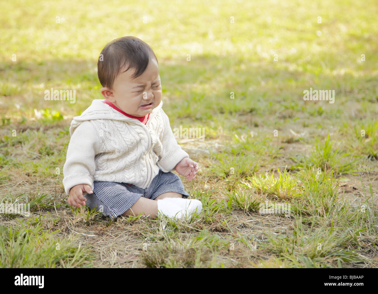 Baby cry sit hi-res stock photography and images - Alamy