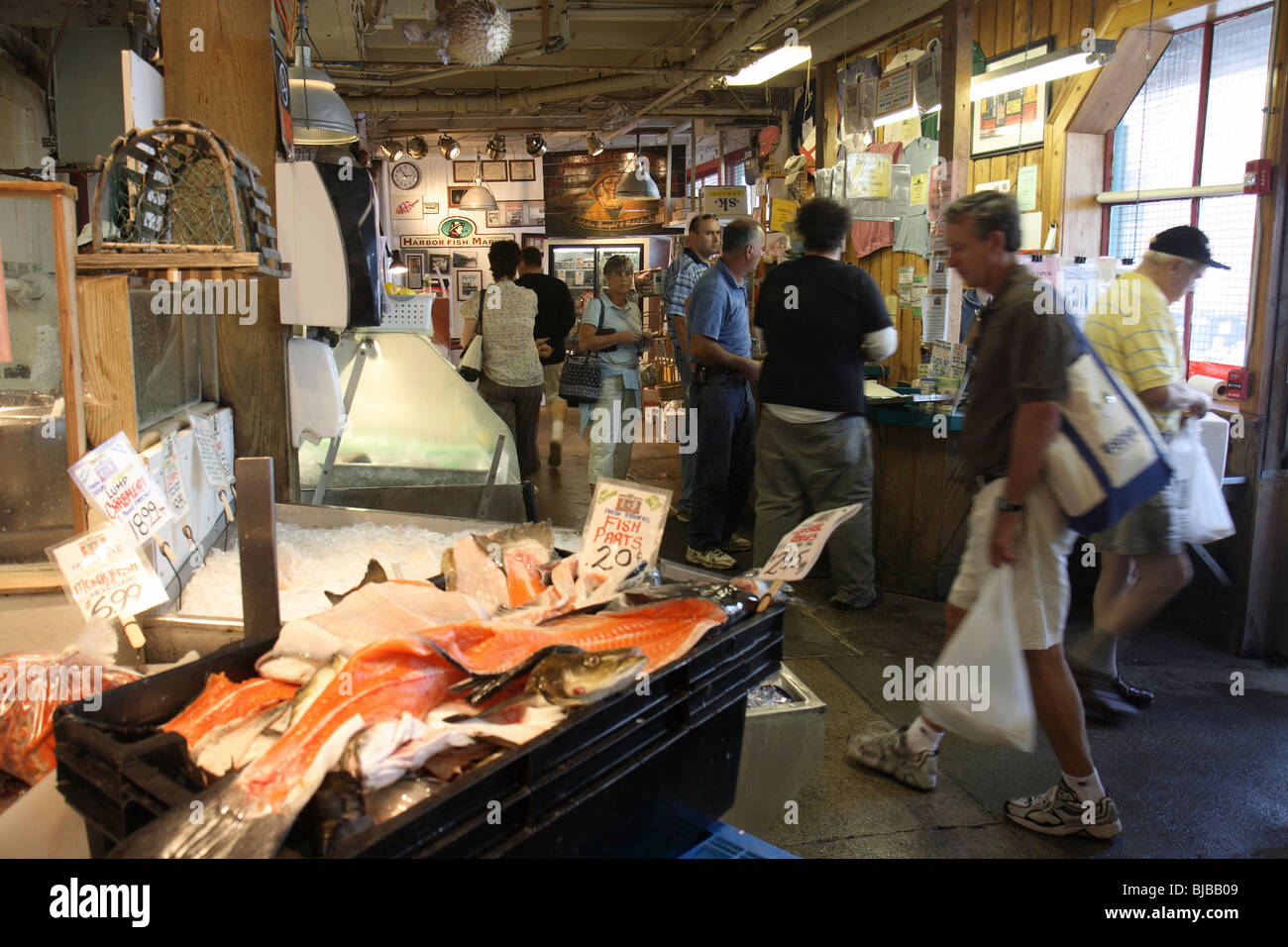 Customers in a fish shop, Portland, United States of America Stock ...