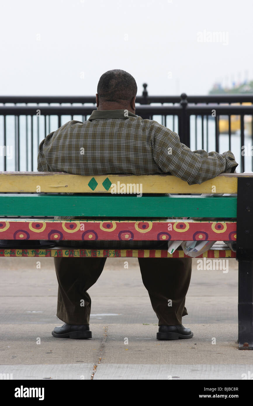Fat Man Sitting On Bench Stock Photos & Fat Man Sitting On Bench Stock ...