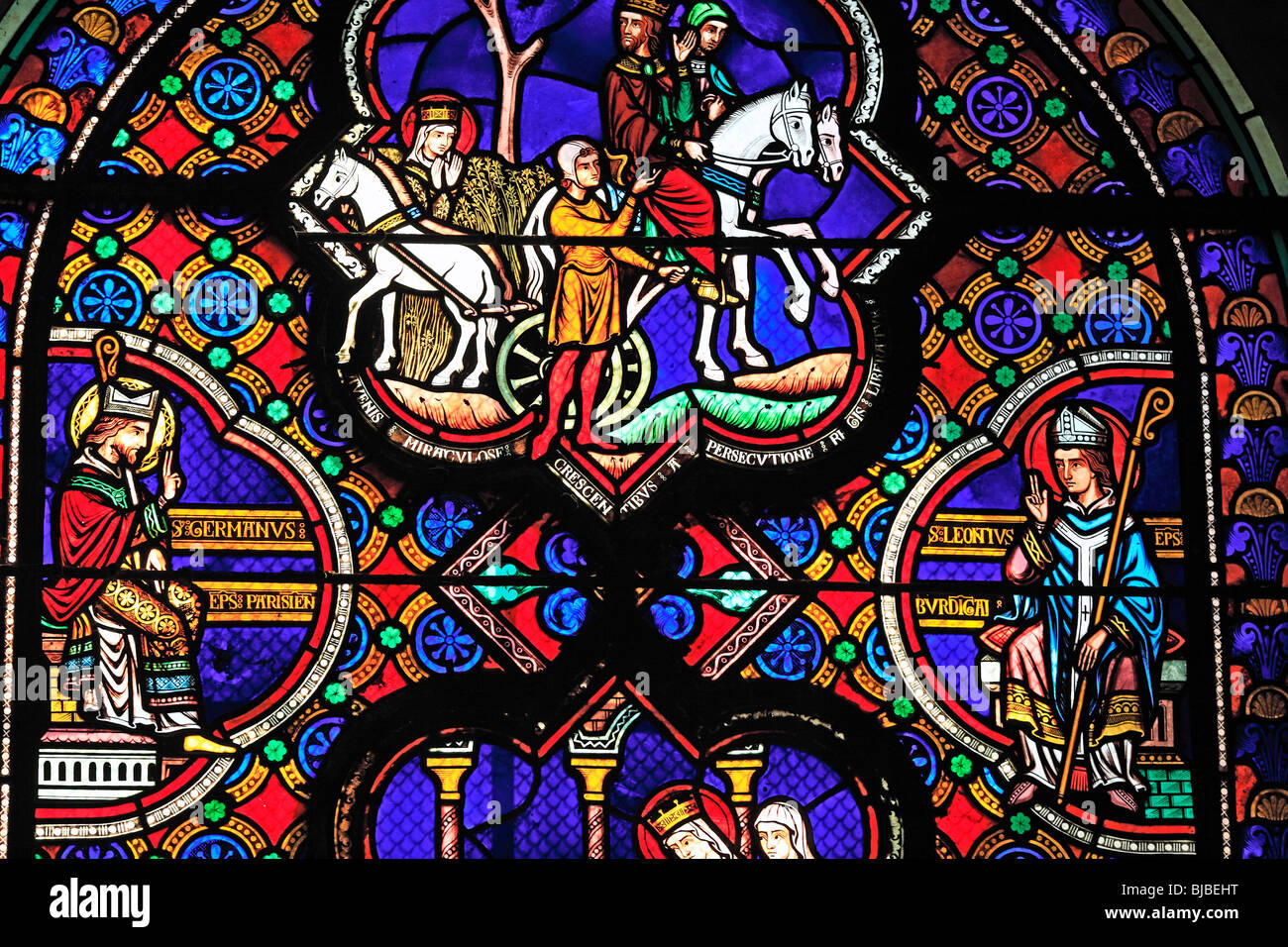 Romanesque coloured stained window, Glass painting in the church Sainte ...