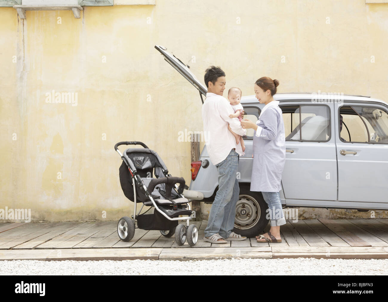 Parents and child outing Stock Photo - Alamy