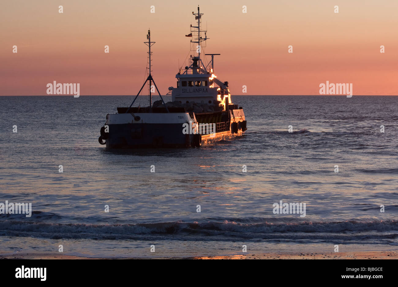 Building sea defence boulder ship hi-res stock photography and images ...