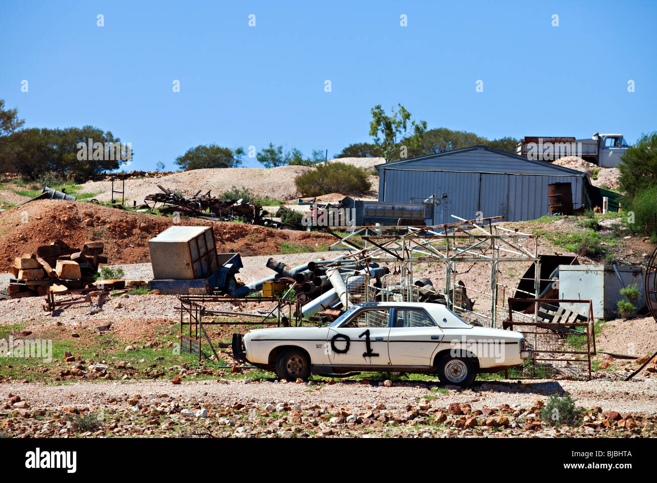 An old abandoned car in an Australian outback town of White Cliffs ...