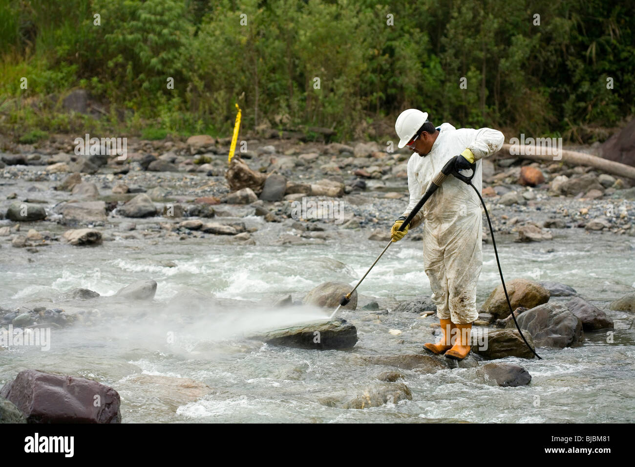 Cleaning up an oil spill on an Amazonian river with a high pressure ...