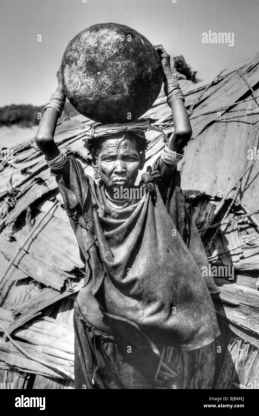 Elderly Galeb Tribe Woman Holding Cooking Pot, Omo Rati, Omo Valley ...