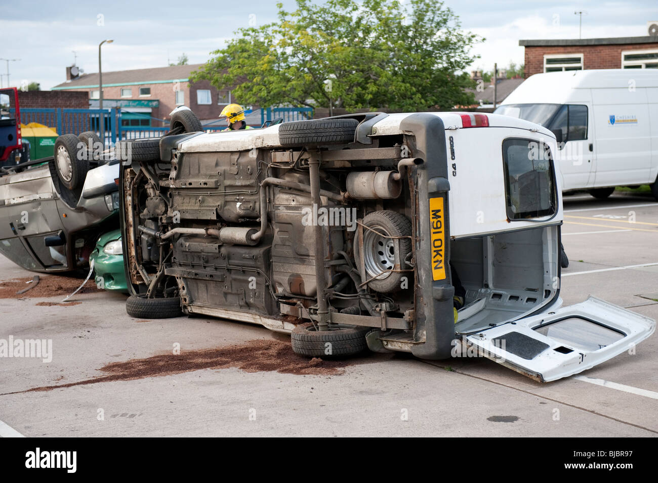 Van crashed on side - exercise Stock Photo - Alamy